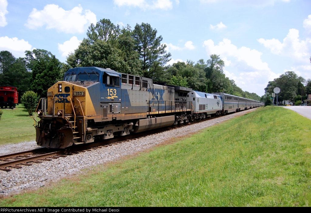 CSX AC-4400CW #153 leads a very late Northbound AUTO TRAIN across Halligan Park Road